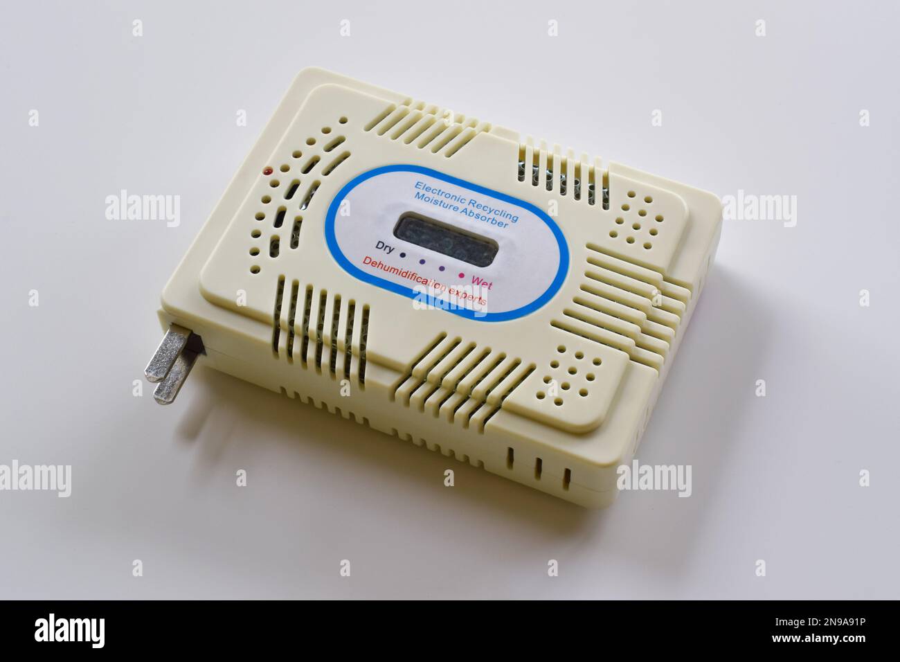 Close-up of electronic moisture absorber isolated on white background ...