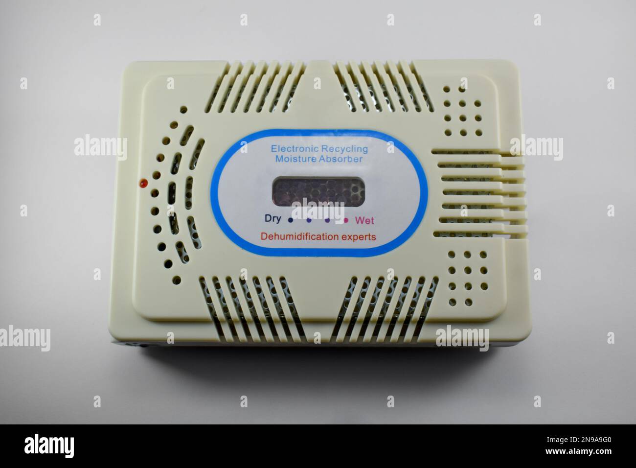 Close-up of electronic moisture absorber isolated on white background ...