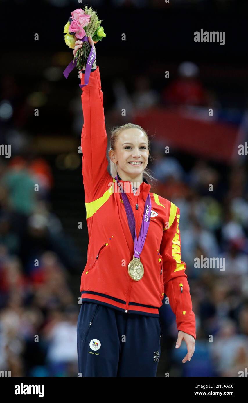 Romania's gold medallist gymnast Sandra Raluca Izbasa celebrates during ...