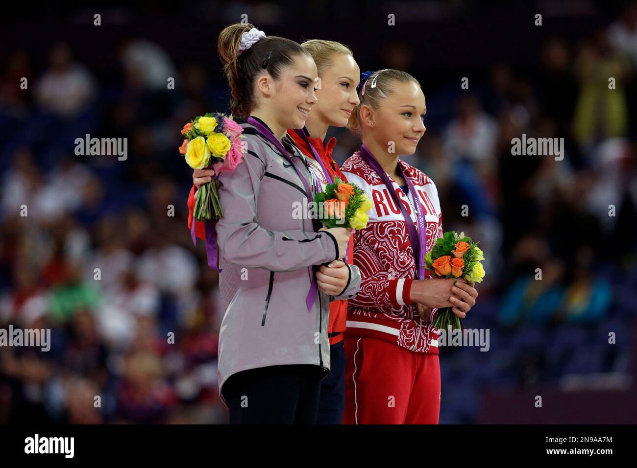 U.S. silver medallist gymnast McKayla Maroney, left, Romania's gold ...