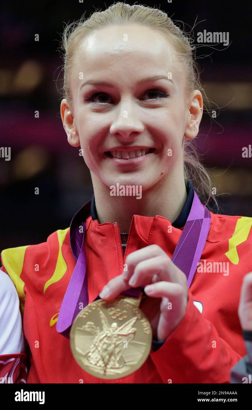 Romania's gymnast Sandra Raluca Izbasa displays her gold medal during ...