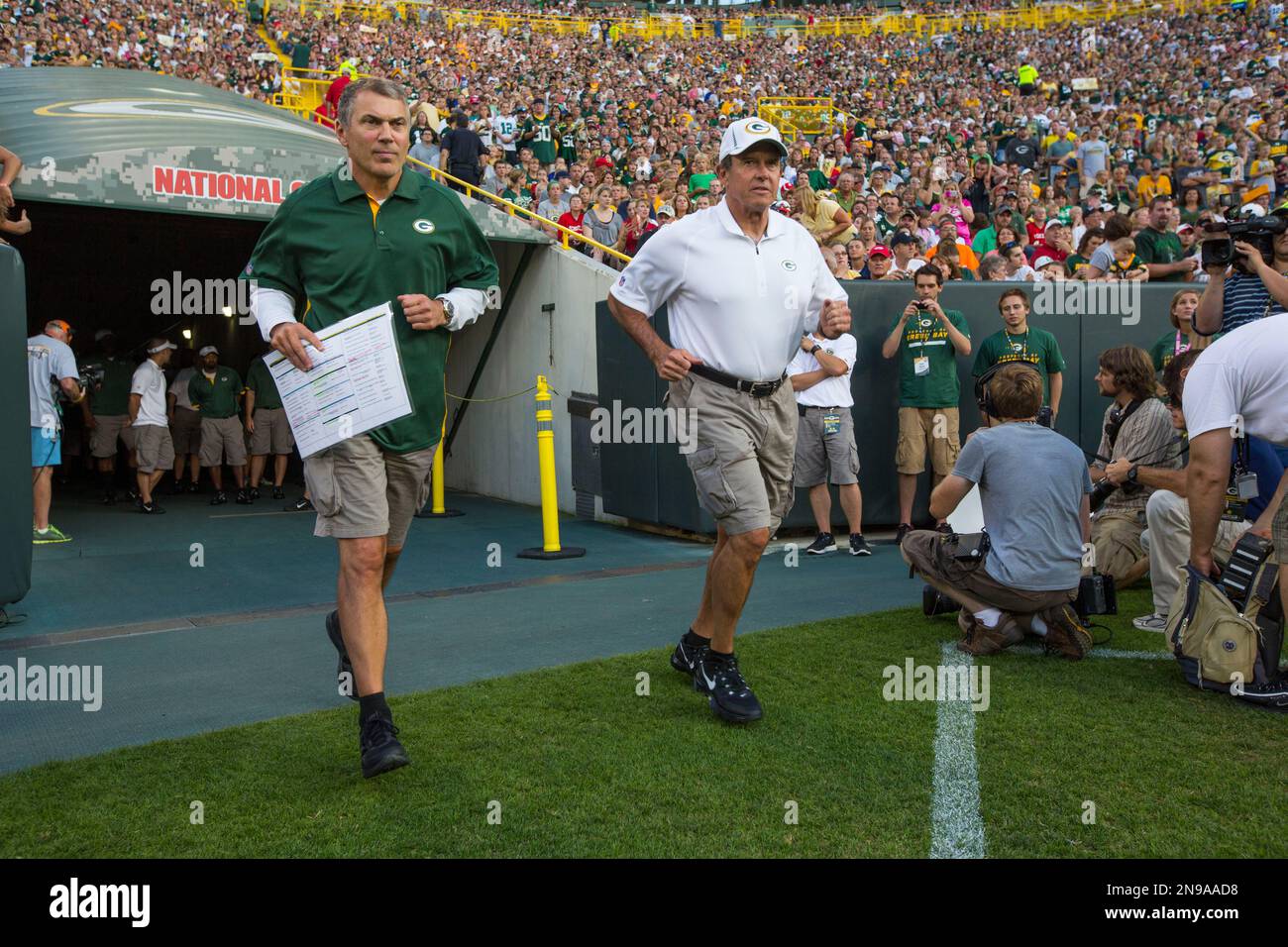 Packers offensive coordinator Tom Clements and defensive coordinator ...