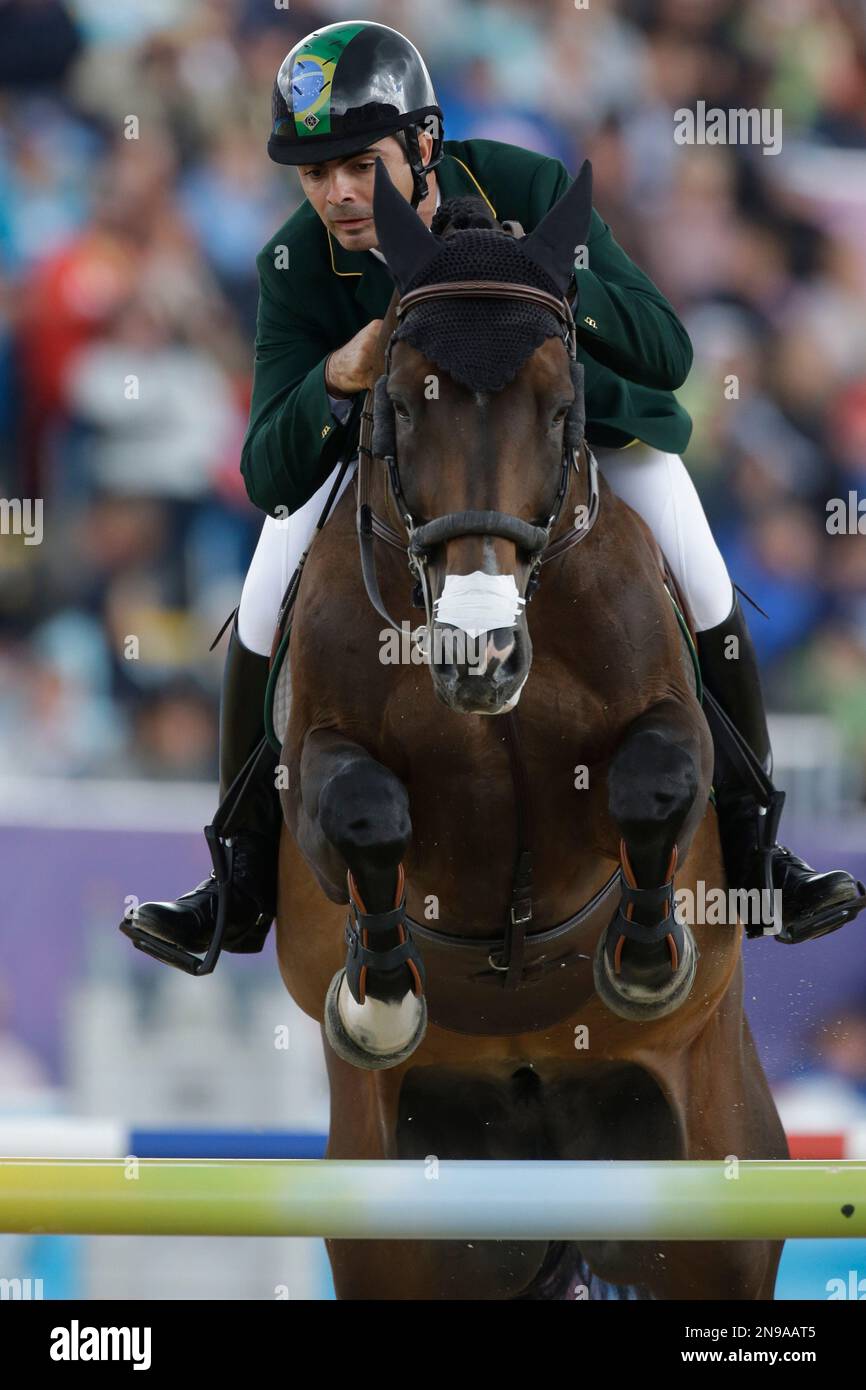 Rodrigo Pessoa of Brazil competes with his horse Rebozo in the ...