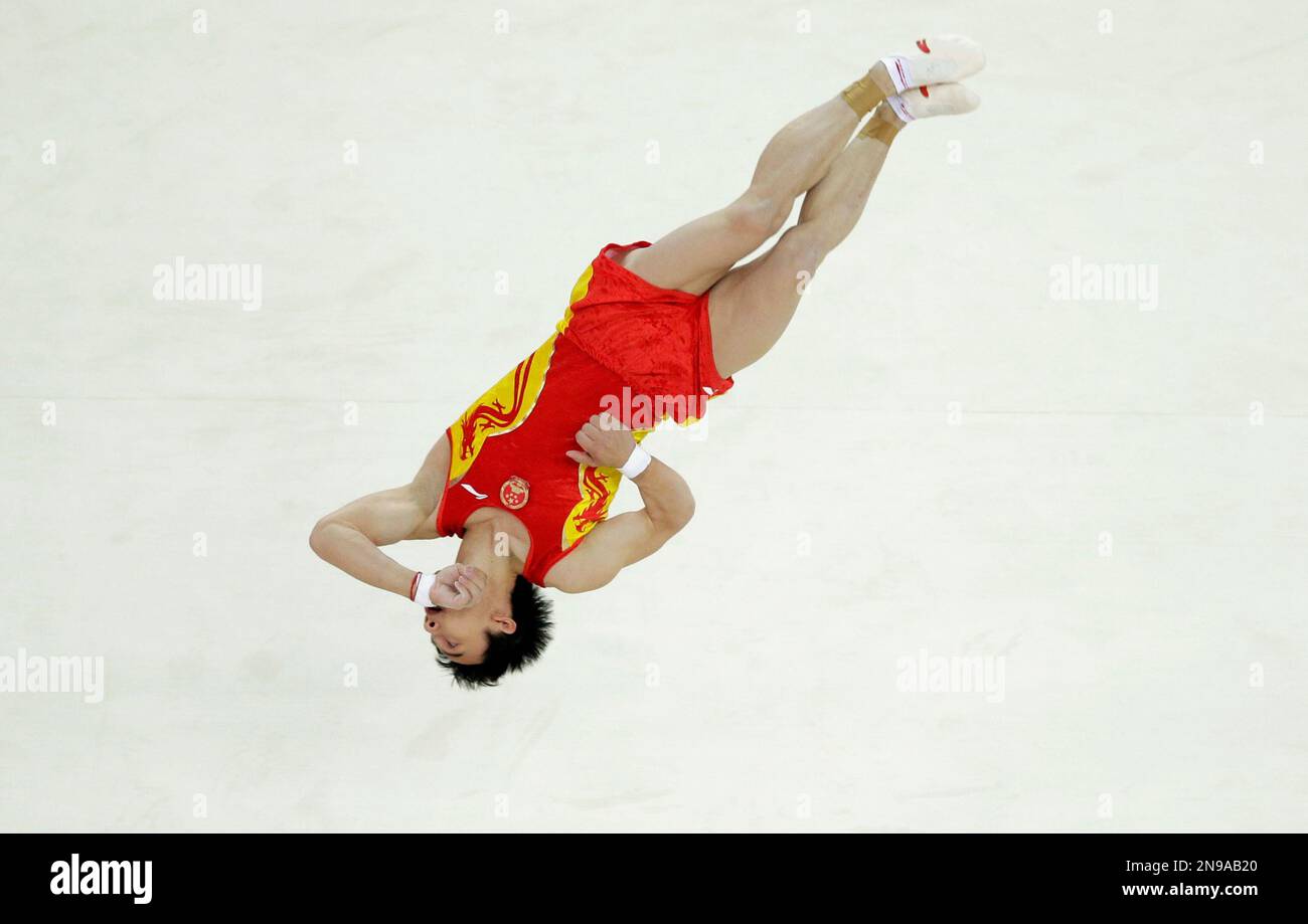 Chinese gymnast Zou Kai performs during the artistic gymnastics men's ...