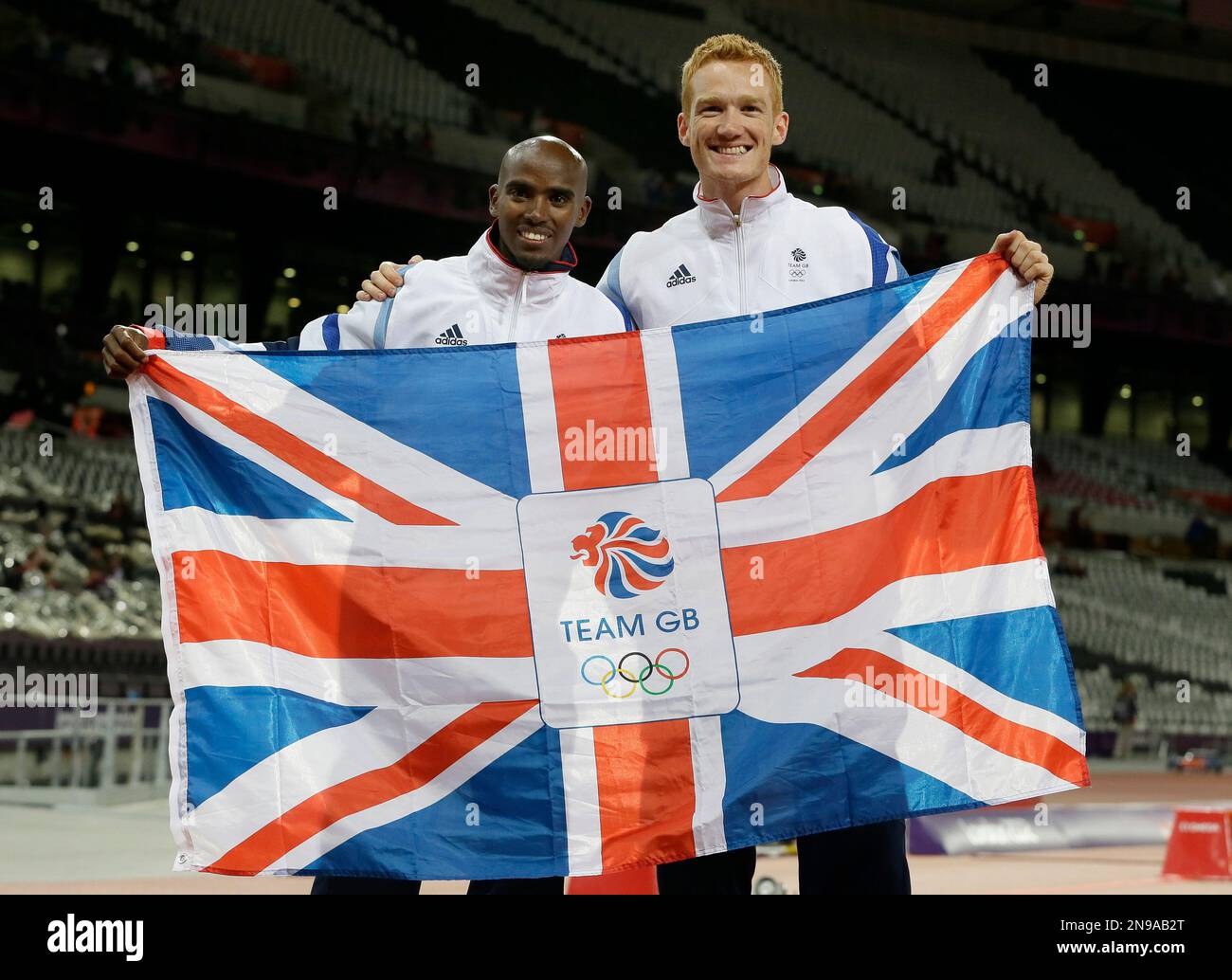 Britain's Mo Farah, left, and Britain's Greg Rutherford pose for ...