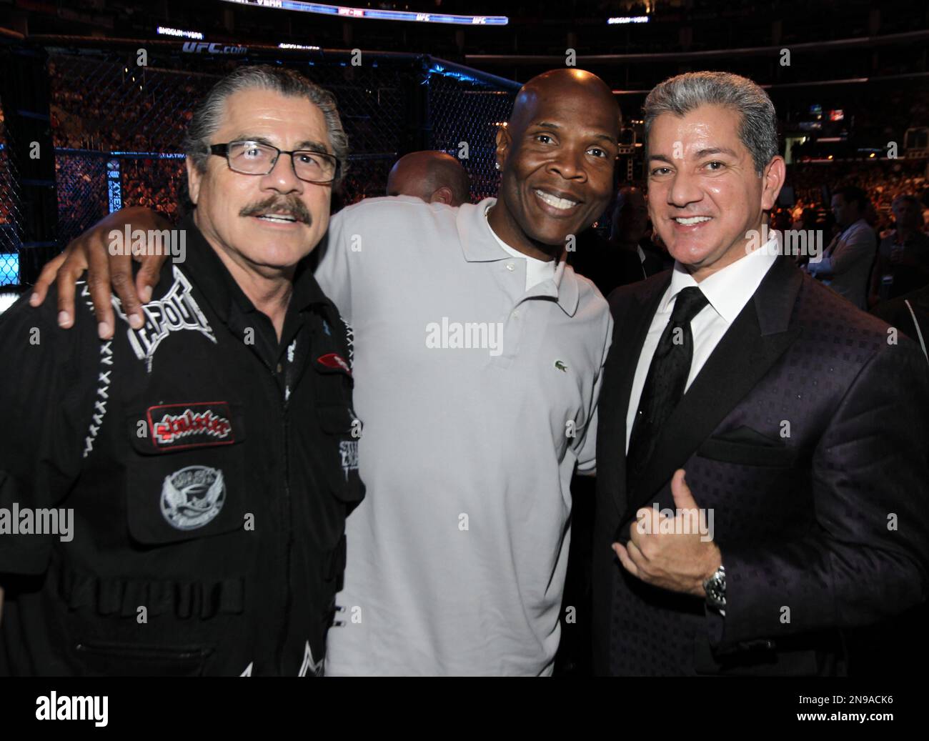 From left, UFC Cutman Stitch, Big Boy, and Bruce Buffer attend the UFC ...