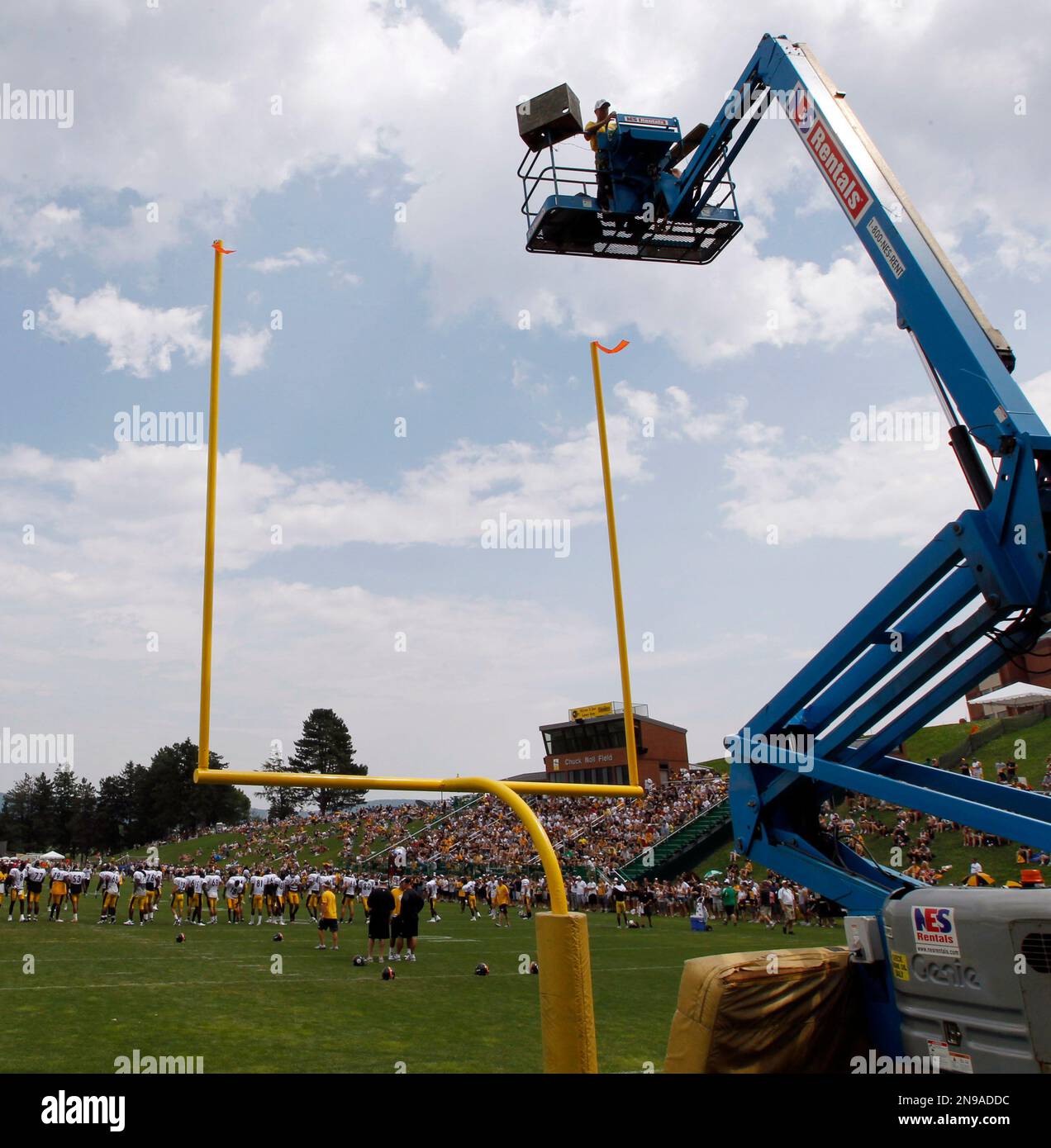 A cameraman, top right, for the Pittsburgh Steelers is lifted above the ...