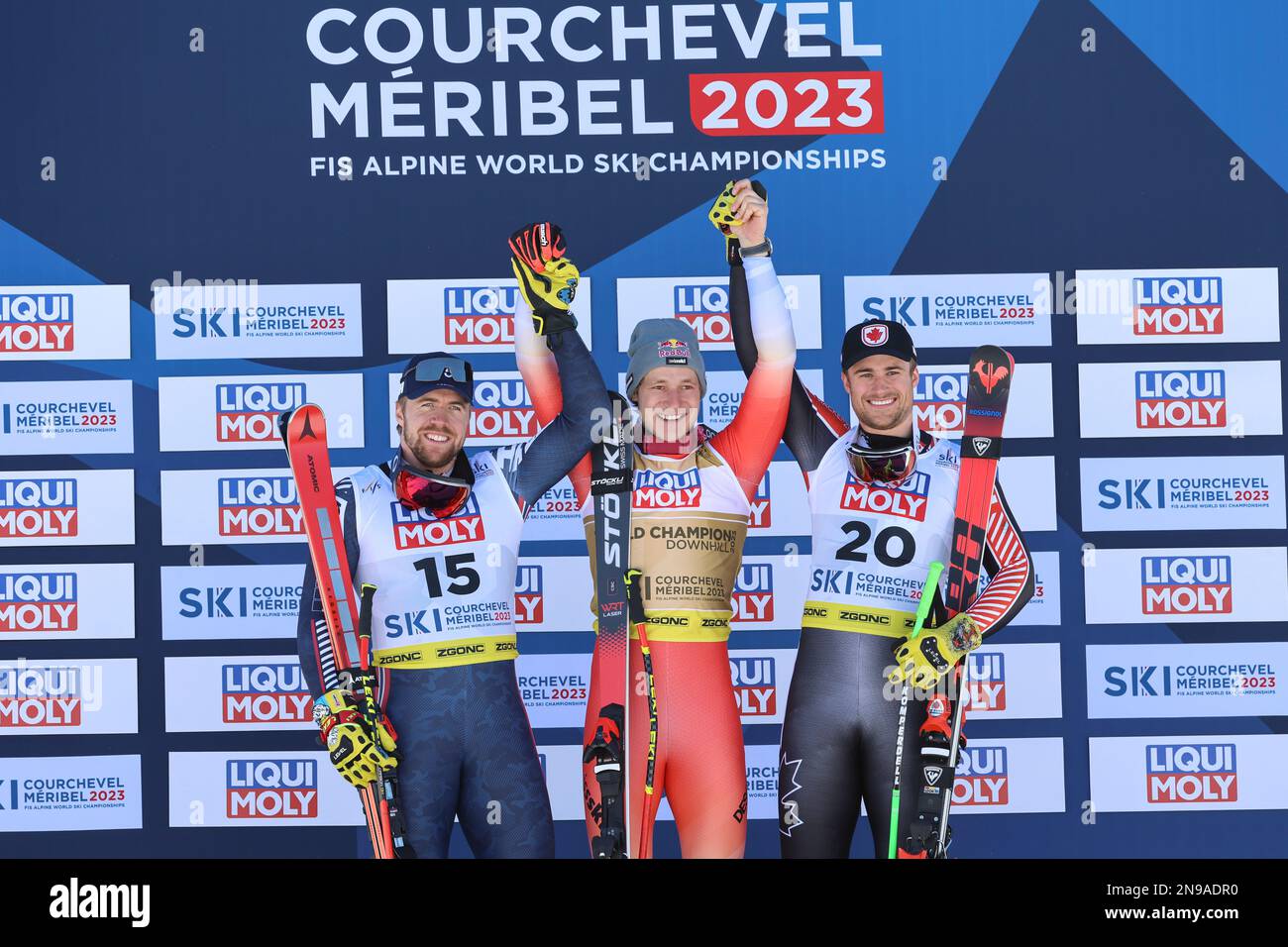 Switzerland's Marco Odermatt , center, winner of the alpine ski, men's World Championship ...