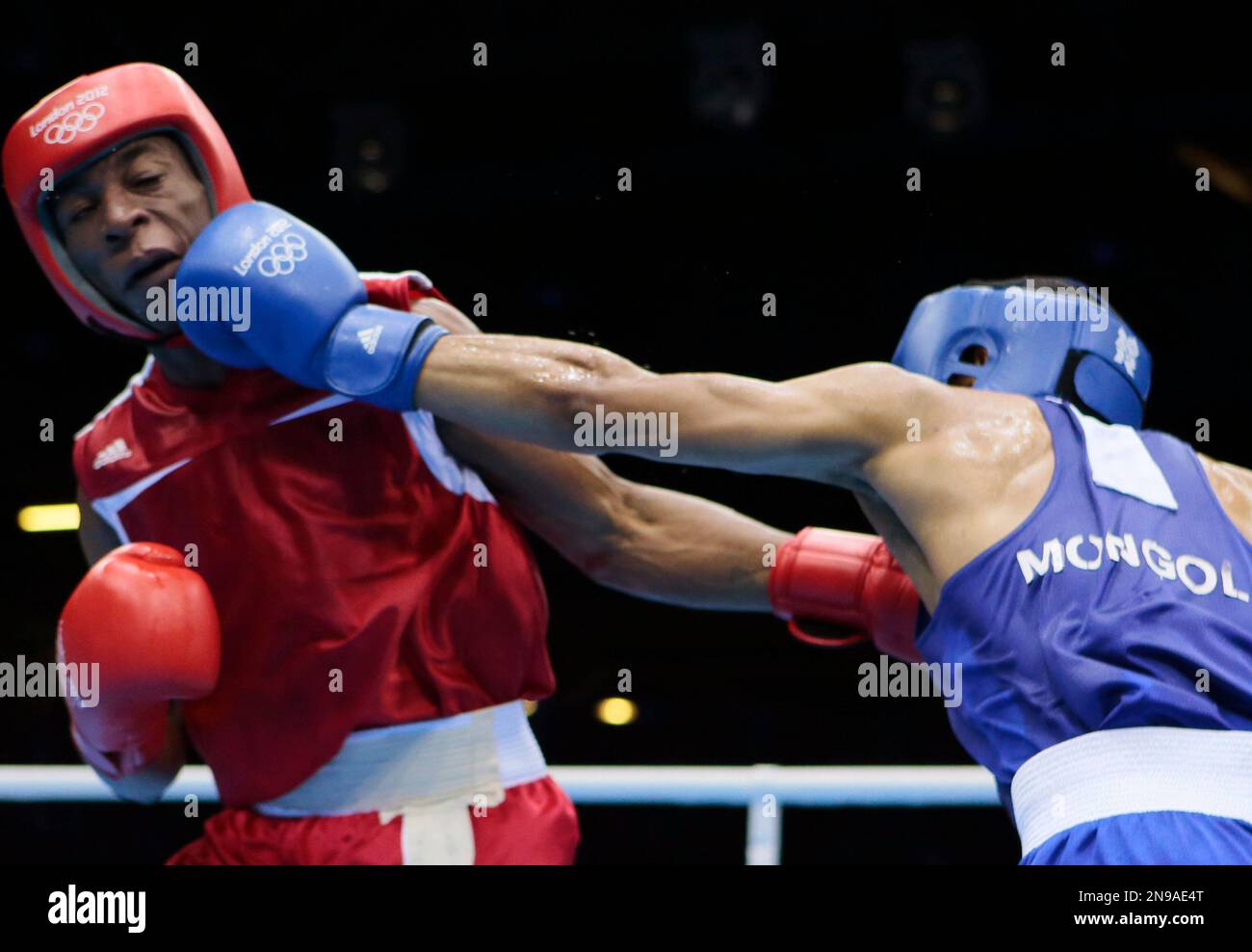 Richarno Colin of Mauritius, left, and Munkh-Erdene Uranchimeg of ...