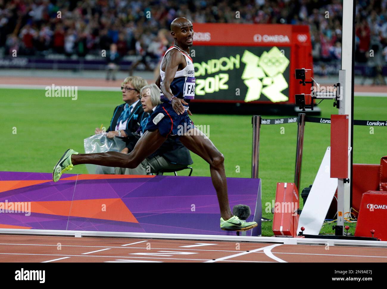 Gold medal winner, Britain's Mo Farah, competes in the men's 10,000 ...