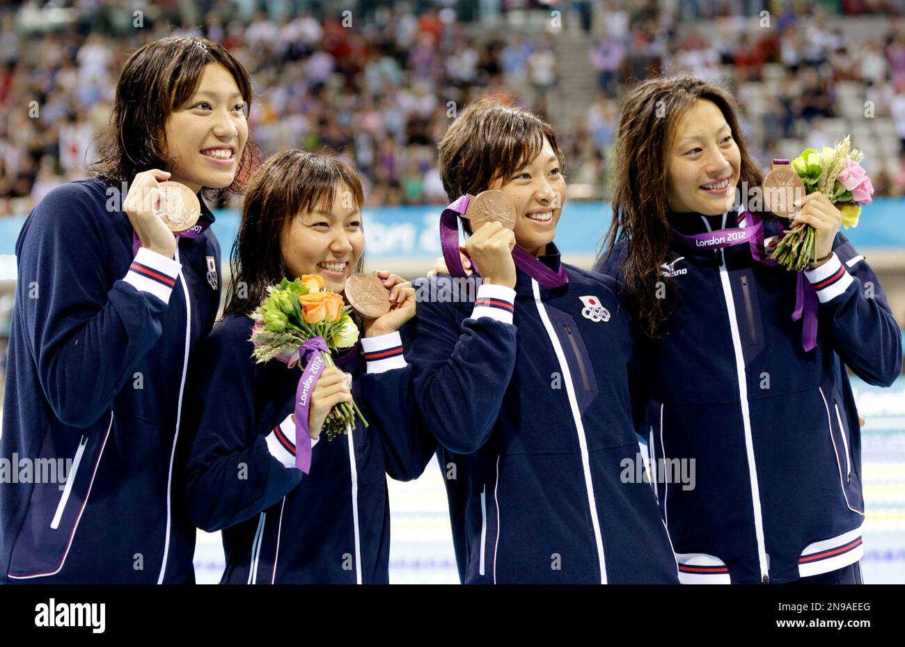 Japan's women's 4 x 100-meter medley relay team members from left, Aya ...