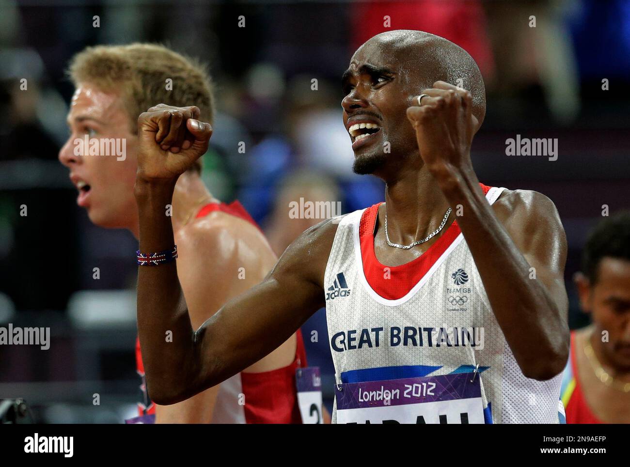 Britain's gold medal winner Mo Farah celebrates after the men's 10000 ...