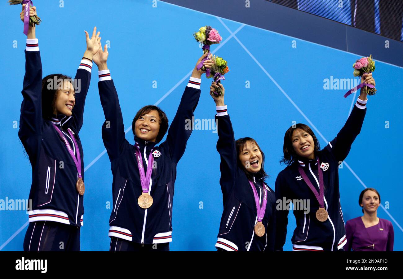 Japan's women's 4 x 100-meter medley relay team members from left, Aya ...