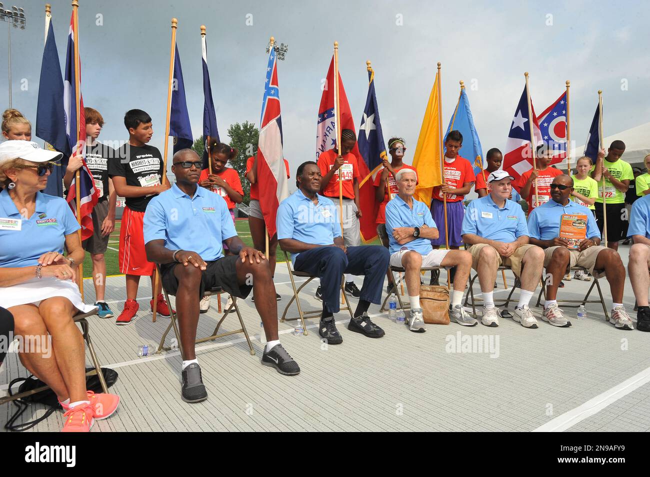 Olympic legends Carl Lewis and Rafer Johnson sit during opening remarks ...