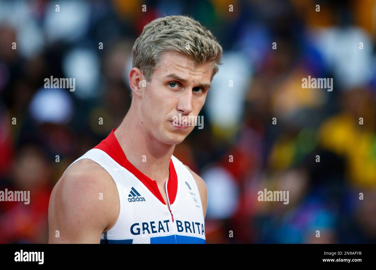 Britain's Jack Green reacts after falling in a men's 400-meter hurdles ...