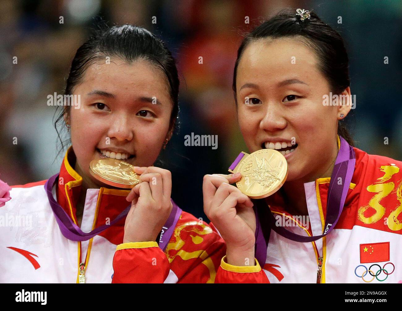 Gold medalists Zhao Yunlei, right, and Tian Qing, of China, pose at the ...