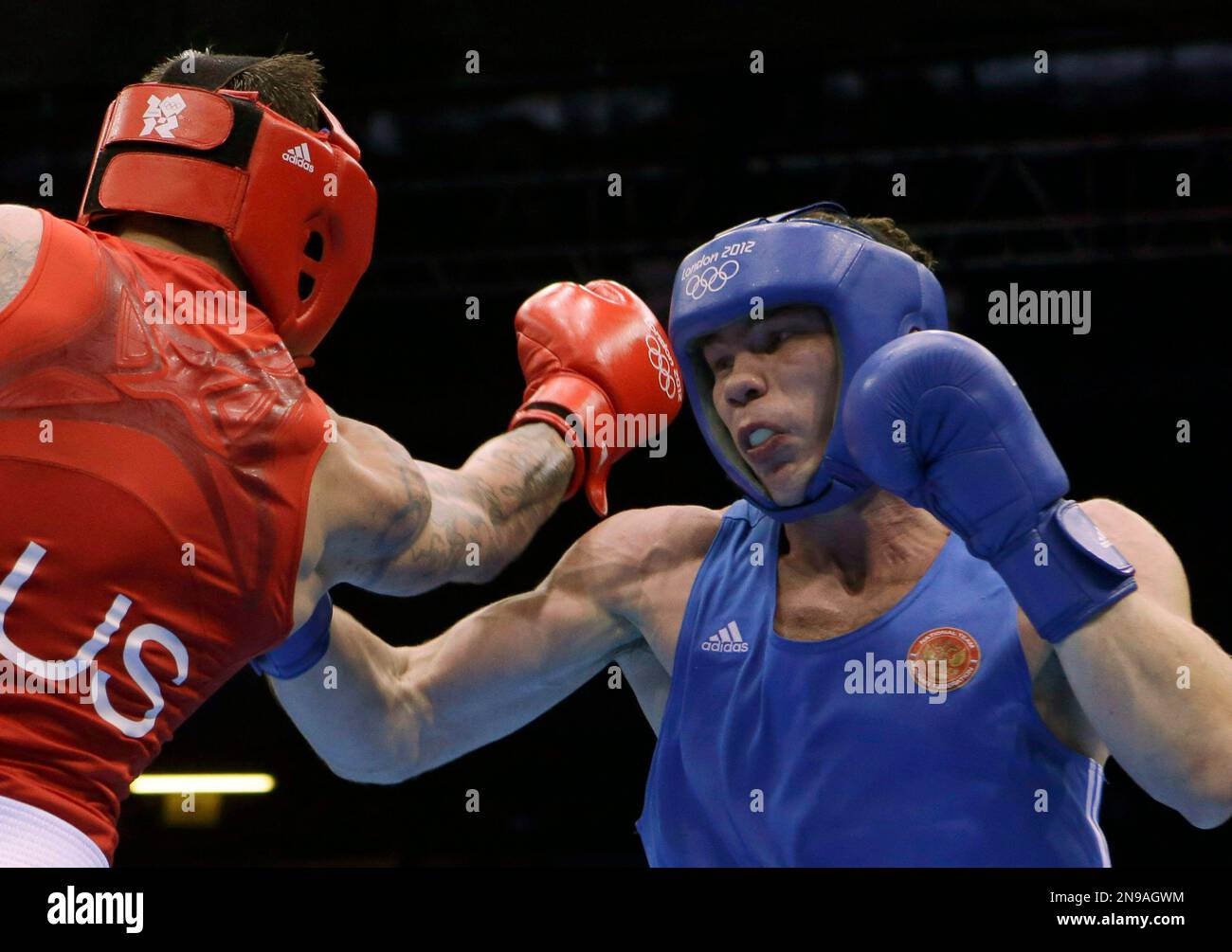 Damien Hooper of Australia, left, and Egor Mekhontcev of Russia, fight ...