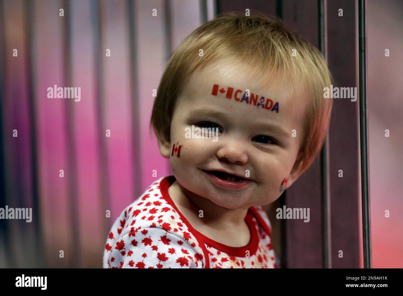 Seven-month-old Alexander Roberts of Toronto, Canada sports the ...