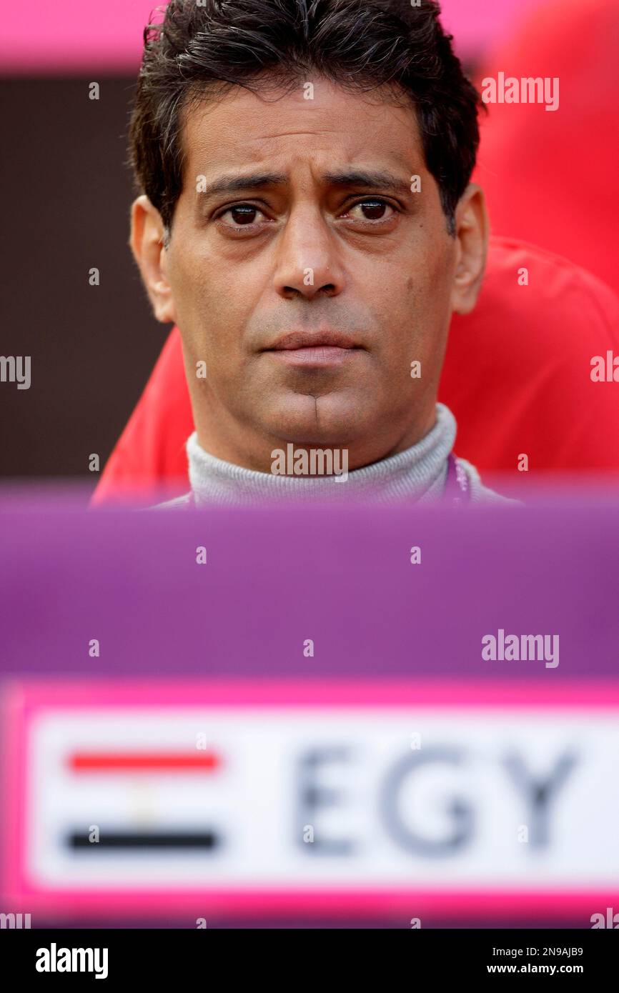 Egypt head coach Hany Ramzy takes his seat before his team's 3-0 loss ...