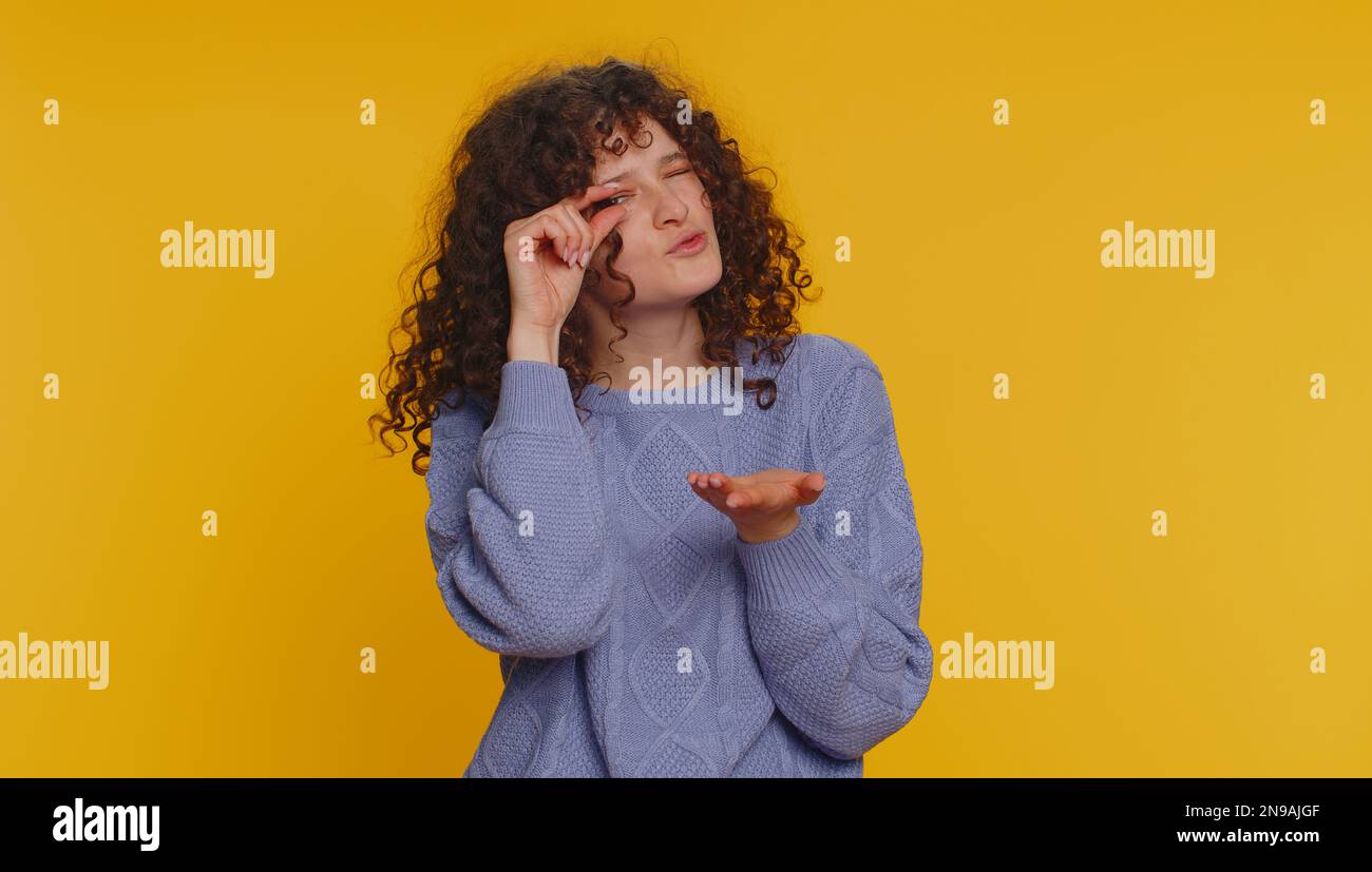 Need some more, please give me. Curly haired woman showing a little bit ...