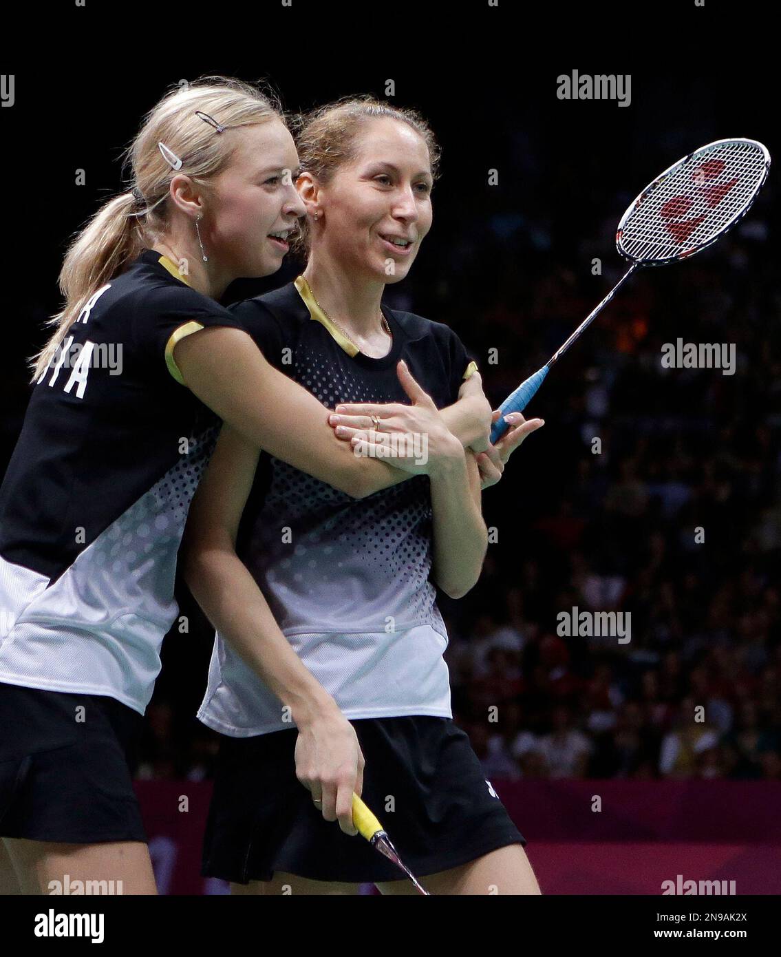 Russia's Valeria Sorokina, right, and Nina Vislova celebrate after ...