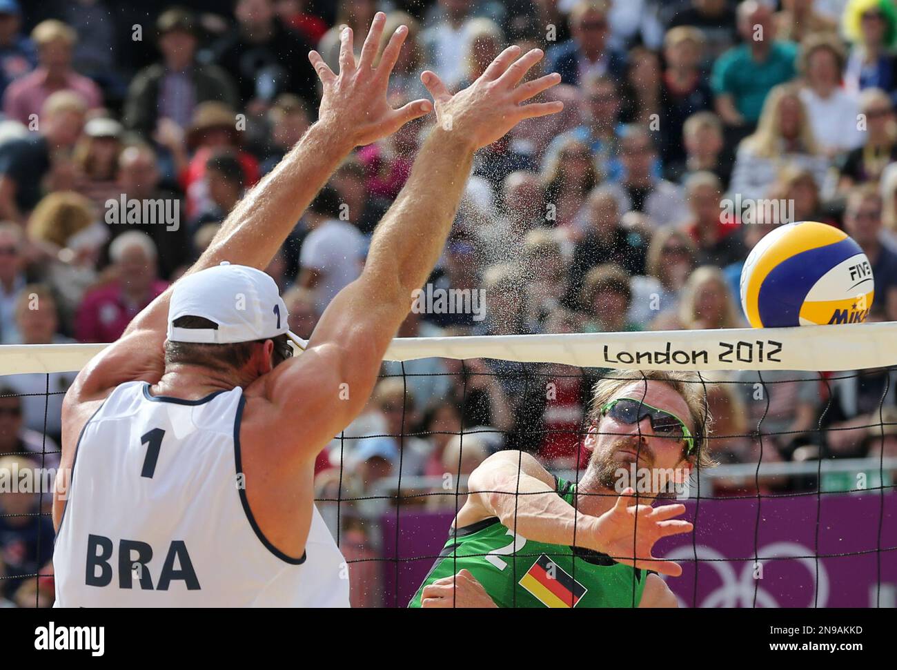 Alison, left, from Brazil tries to block Kay Matysik, right, from ...