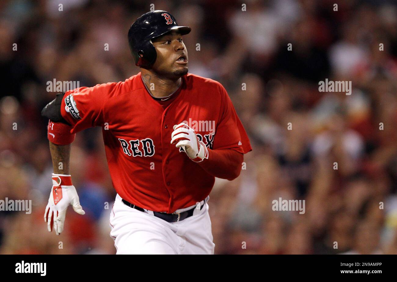 Boston Red Sox's Carl Crawford watches his three-run home run against ...