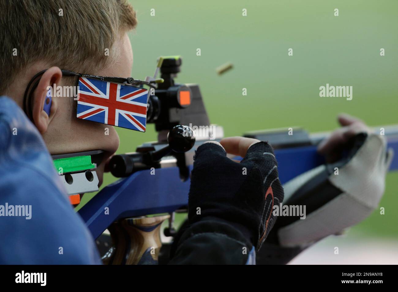 Great Britain's James Charles Huckle ejects a spent casing after firing ...