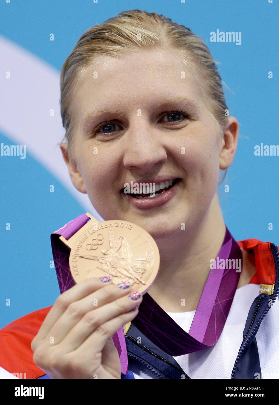 Britain's Rebecca Adlington poses with her bronze medal in the women's ...