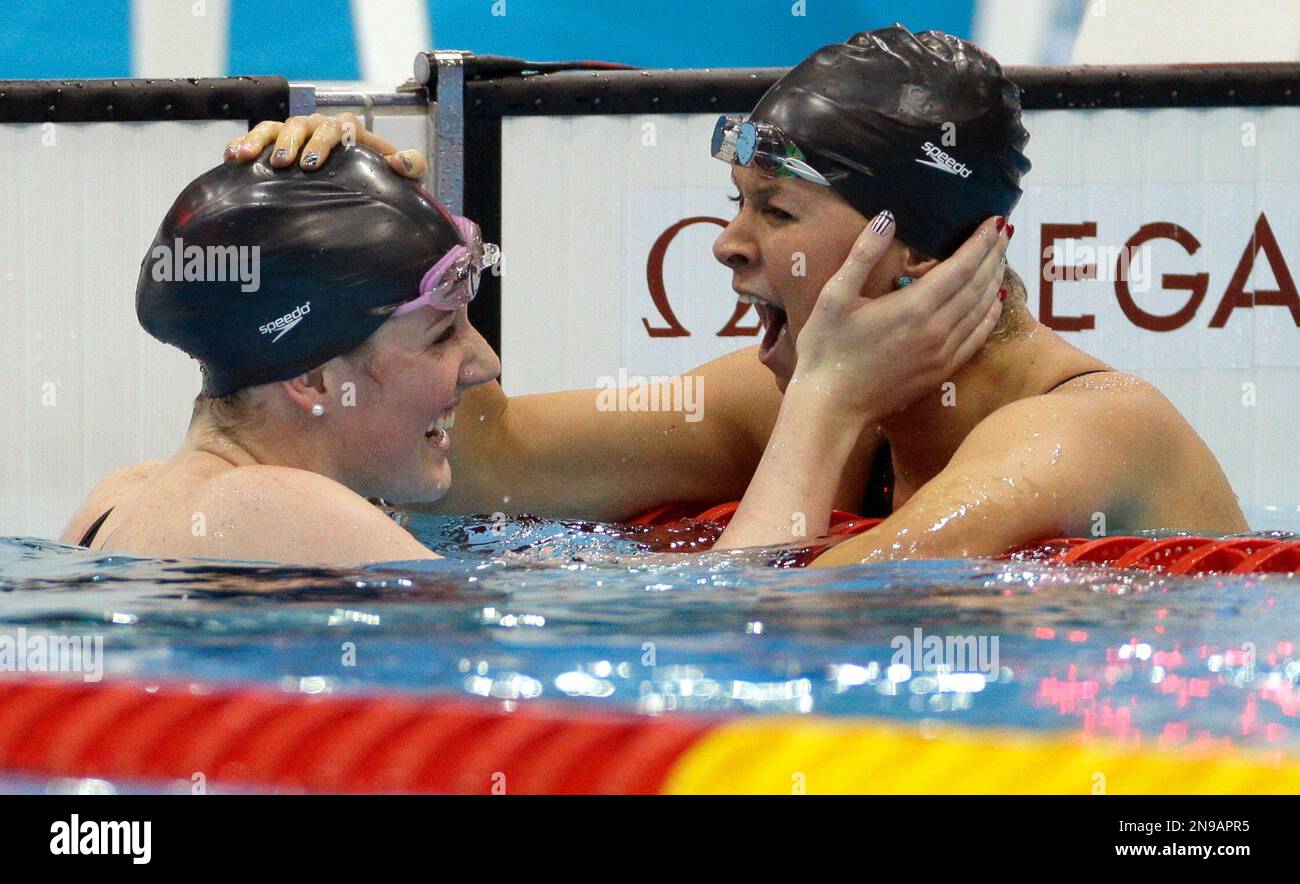 United States' Missy Franklin, left, and teammate Elizabeth Beisel ...