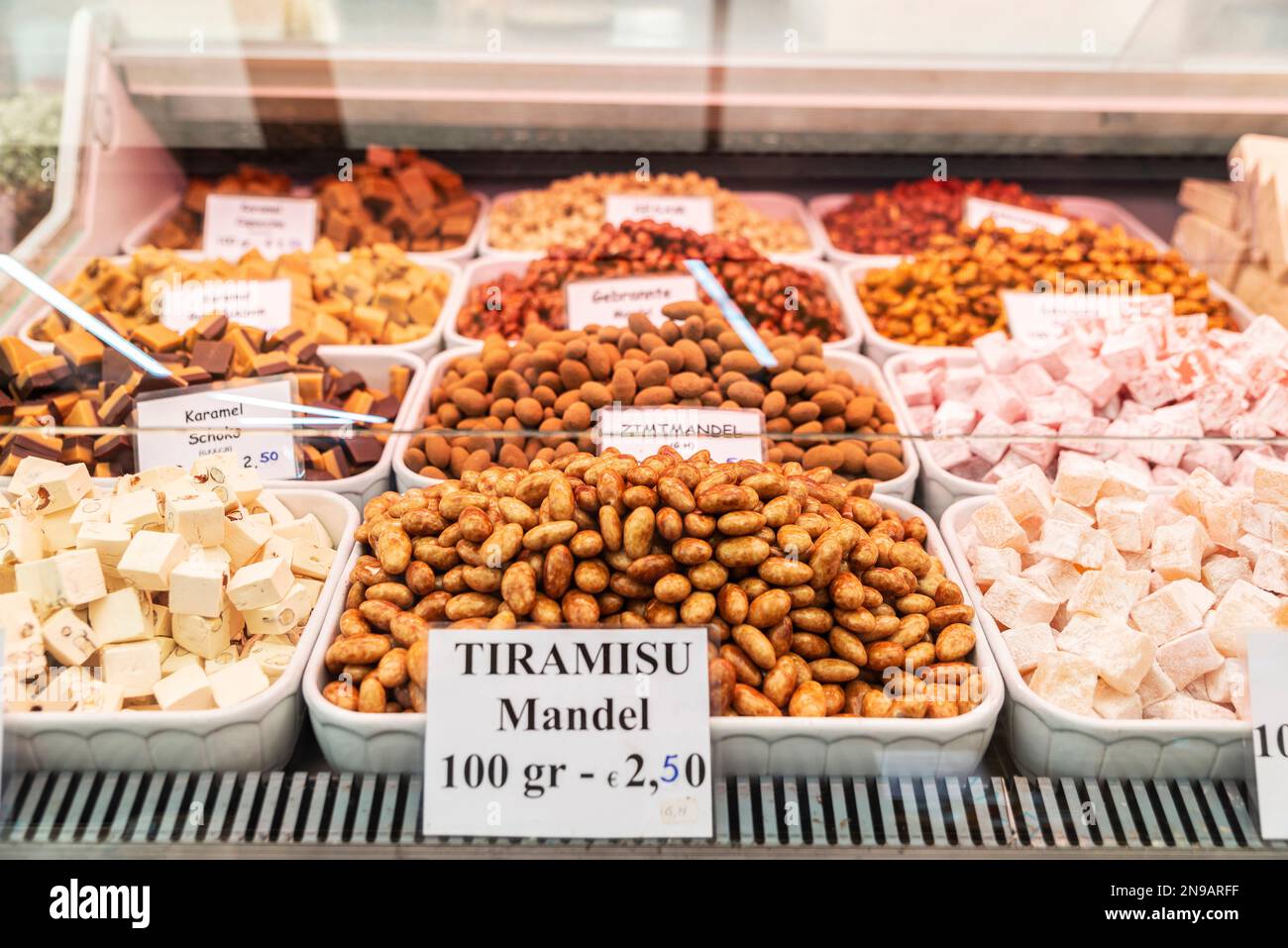 Display of a candy shop with with candied almonds in Naschmarkt, street ...