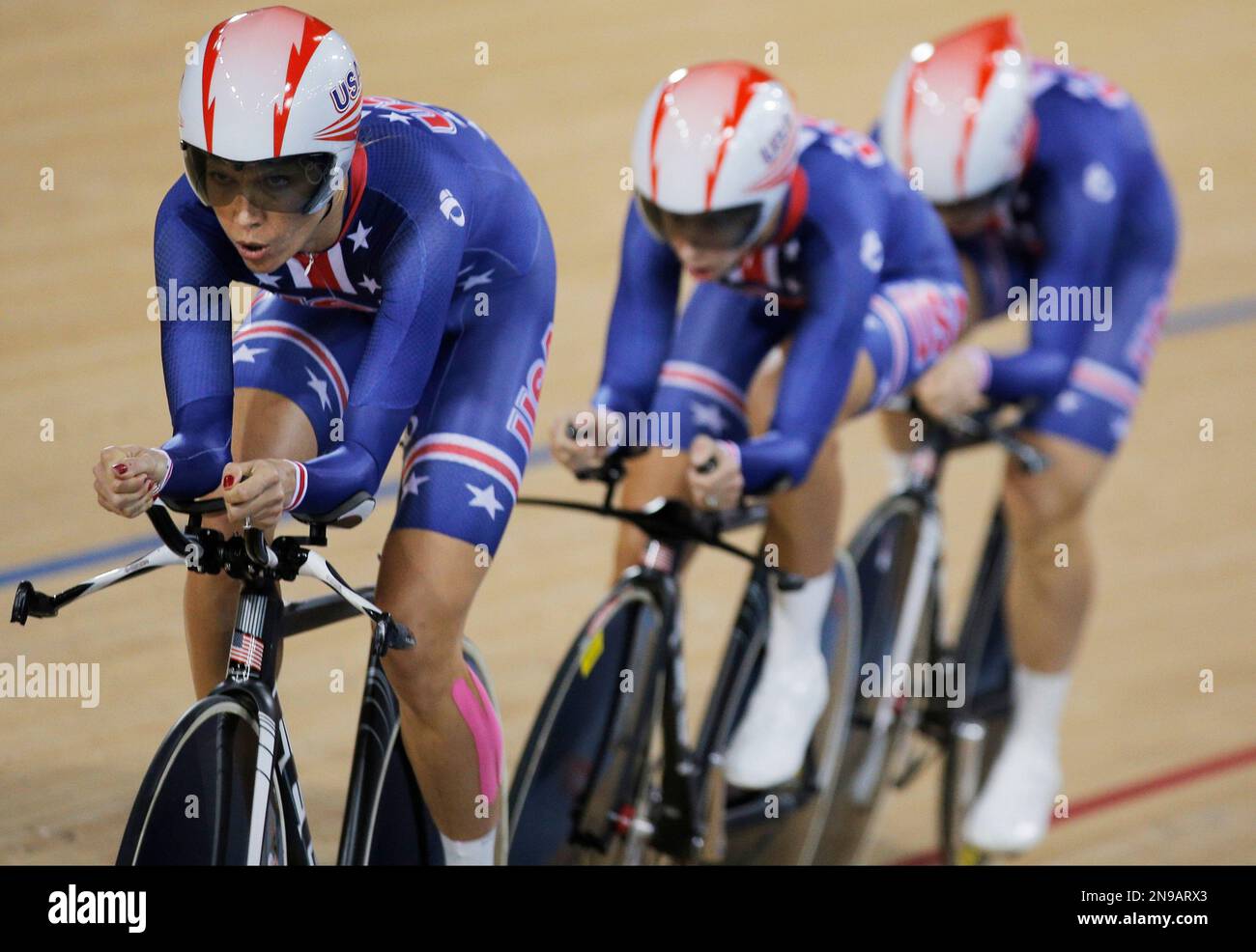 U.S. Dotsie Bausch leads her teammates Sarah Hammer, center, and Jennie ...