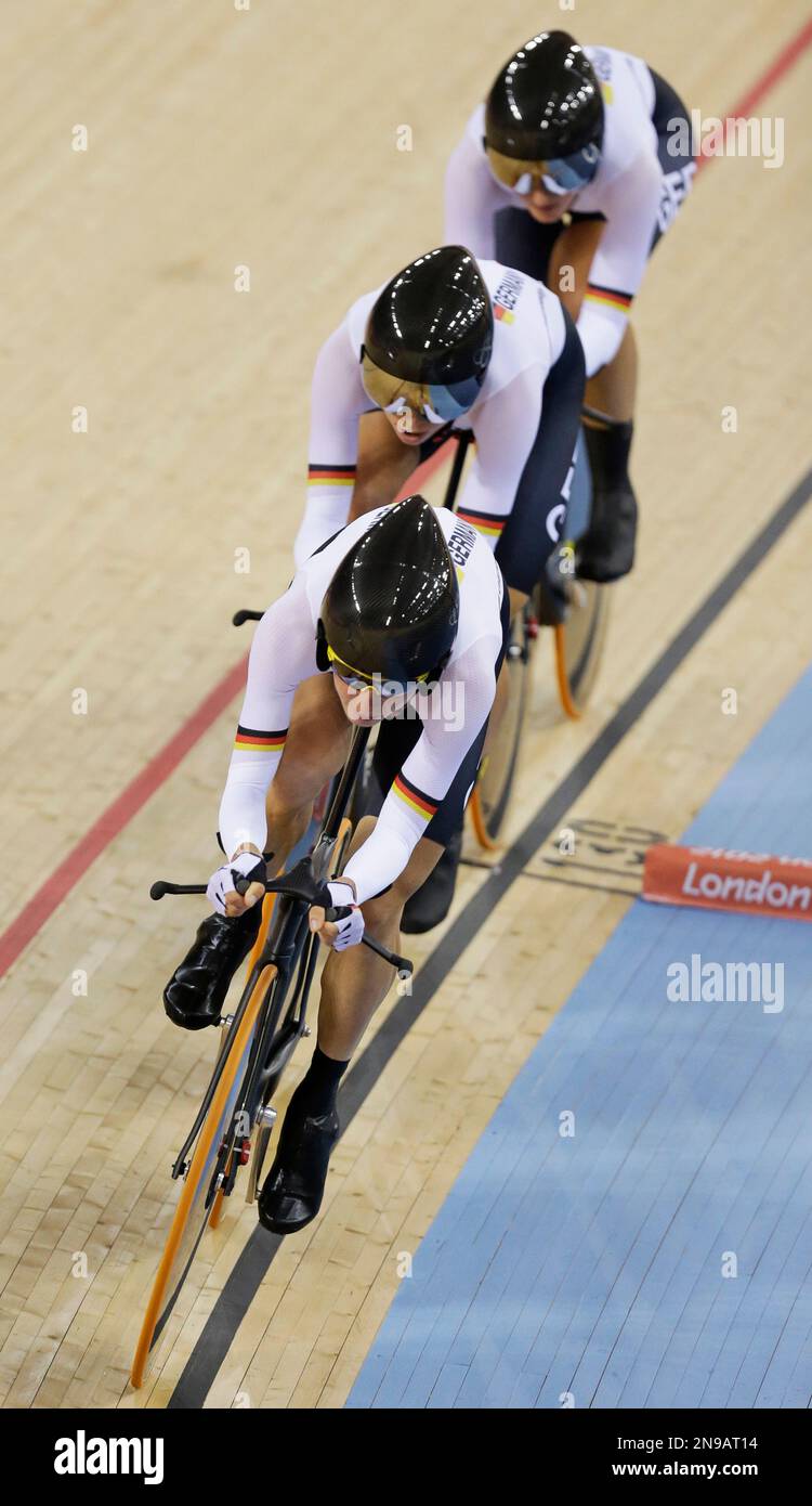The German team competes in a track cycling women's team pursuit event ...