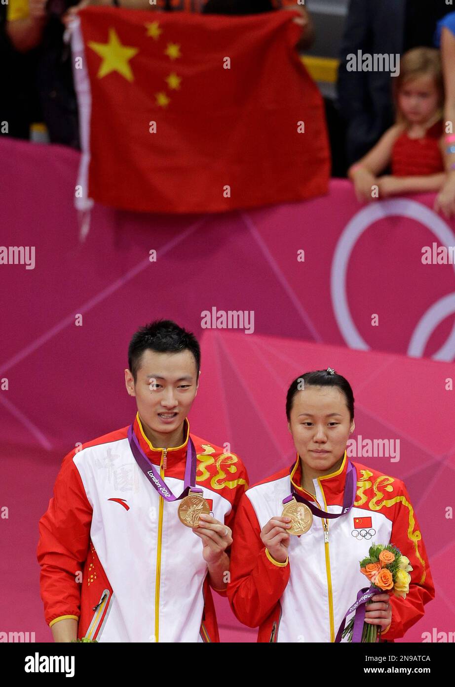 Gold medalists Zhang Nan, left, and Zhao Yunlei, of China, pose at the ...