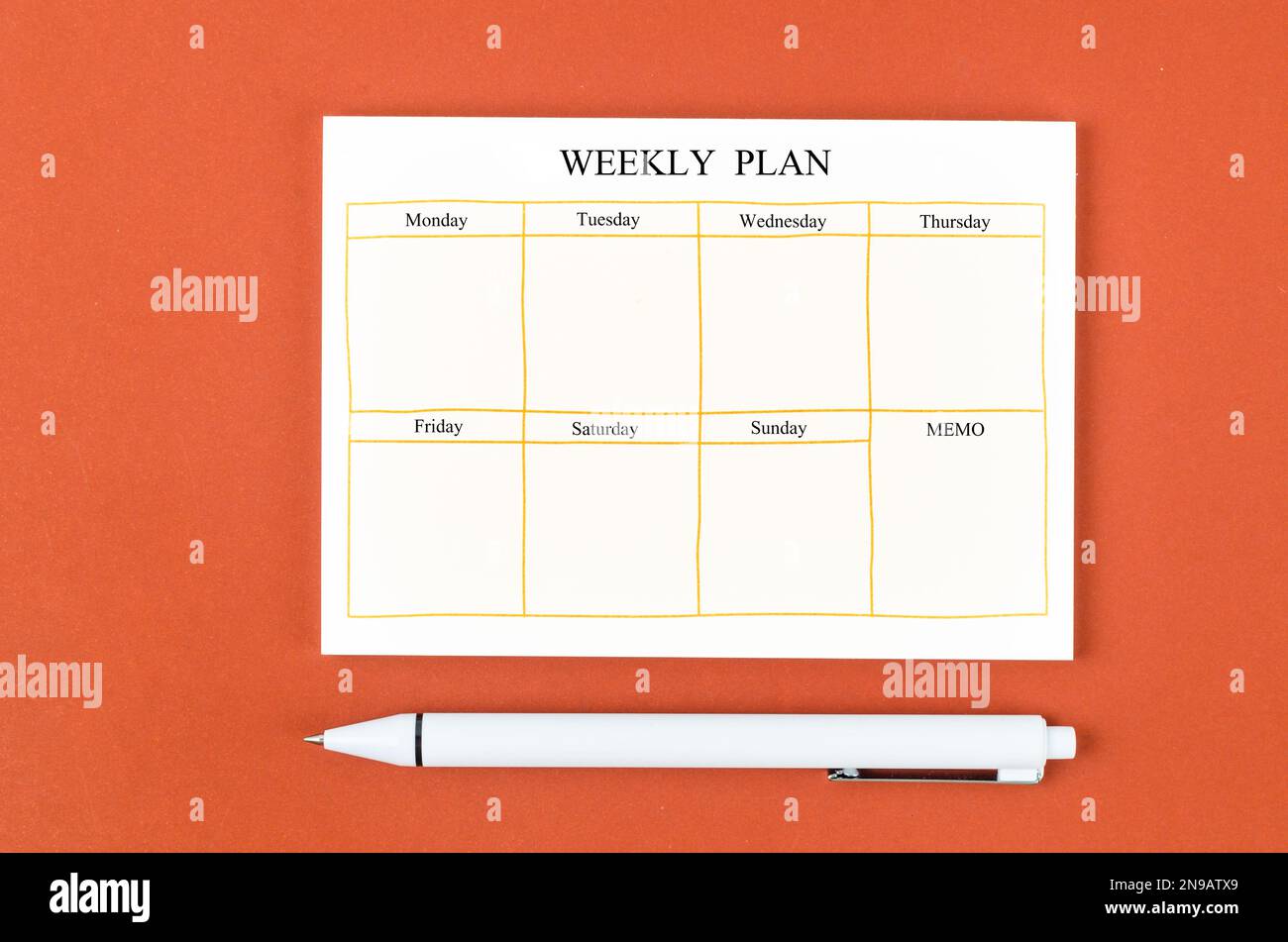 Blank weekly plan notice block on orange colour background. Empty ...