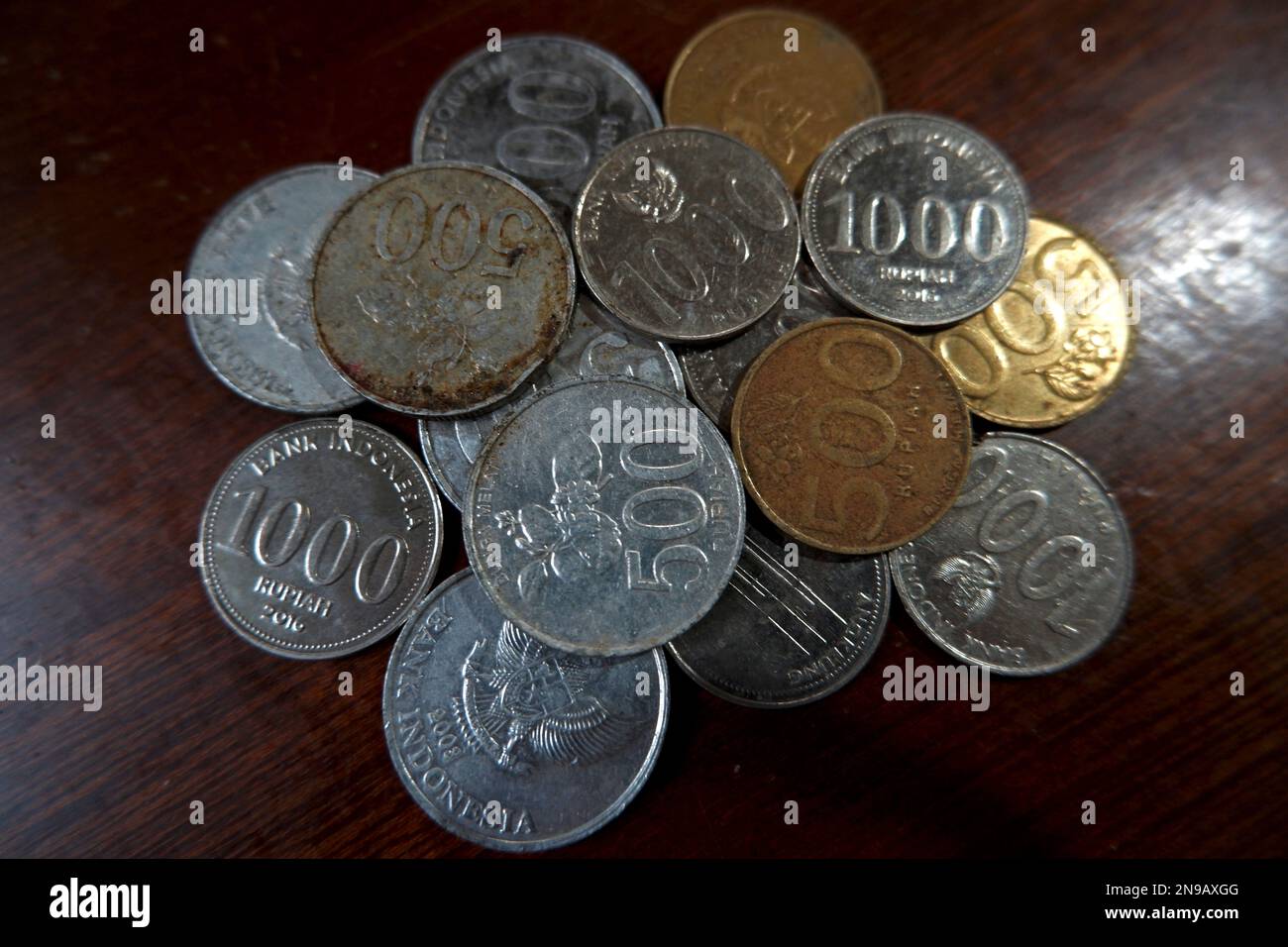 Stacks Of Rupiah Currency In Metal Form, Seen From Above On The Table ...
