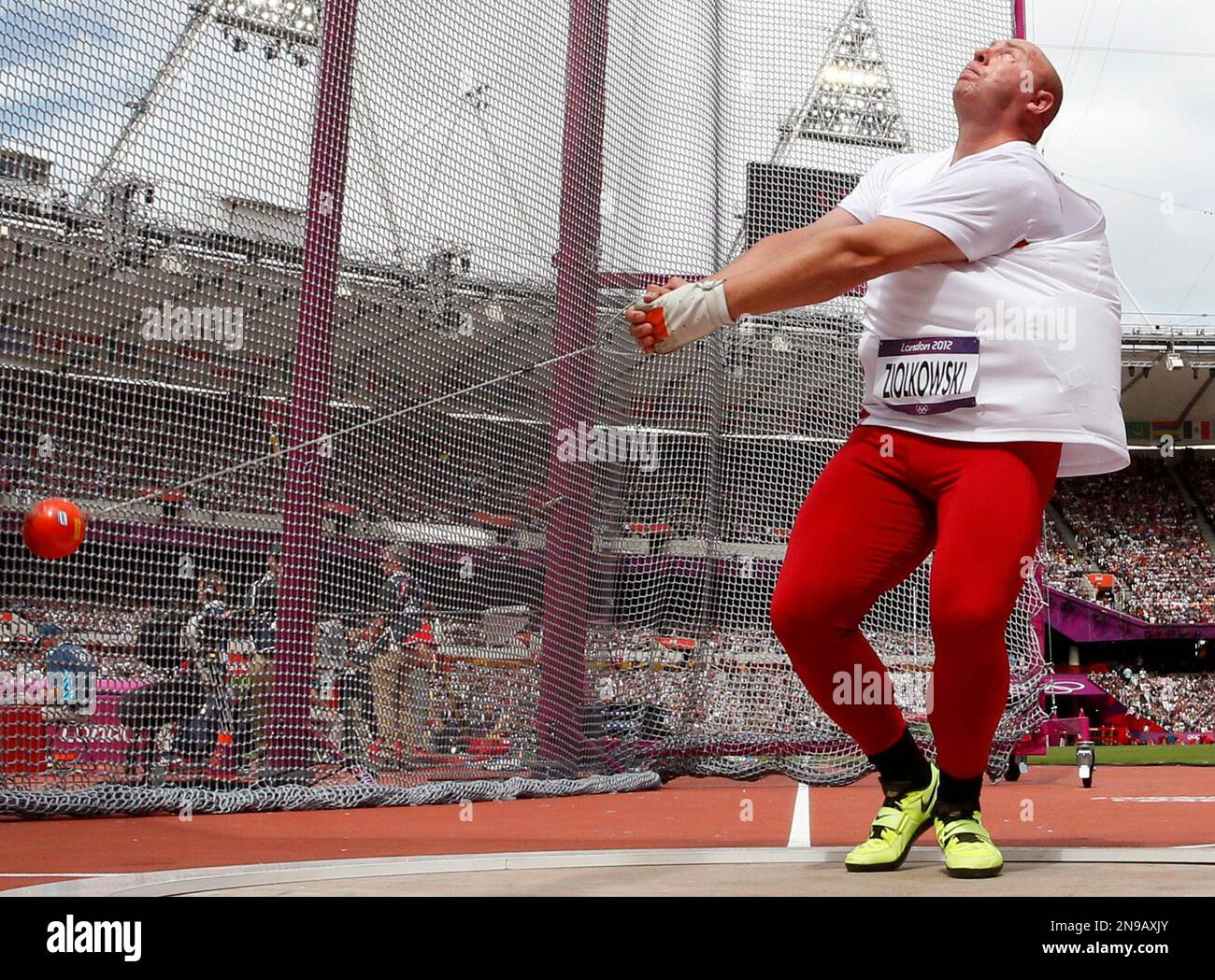 Poland's Szymon Ziolkowski makes an attempt in the men's Hammer Throw ...