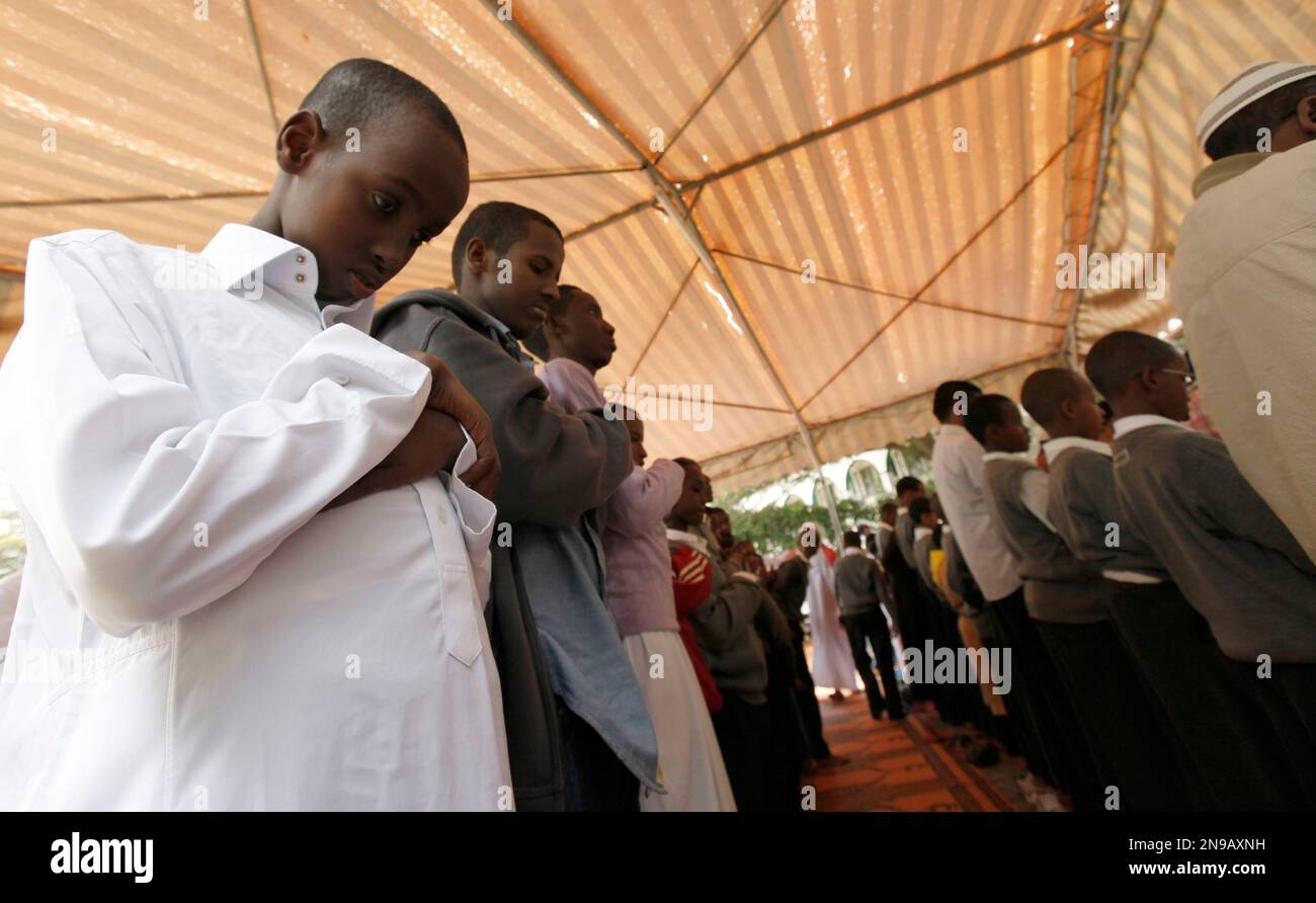 Kenyan Muslims stand for prayer at Noor Mosque during the second Friday ...