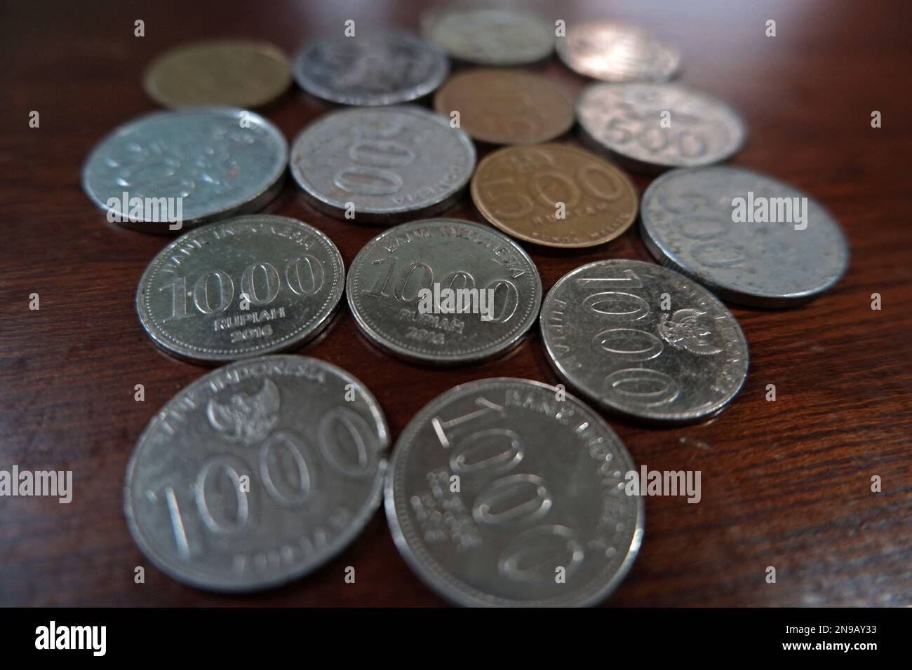 Rupiah Coins Placed On The Surface Of The Table Stock Photo - Alamy