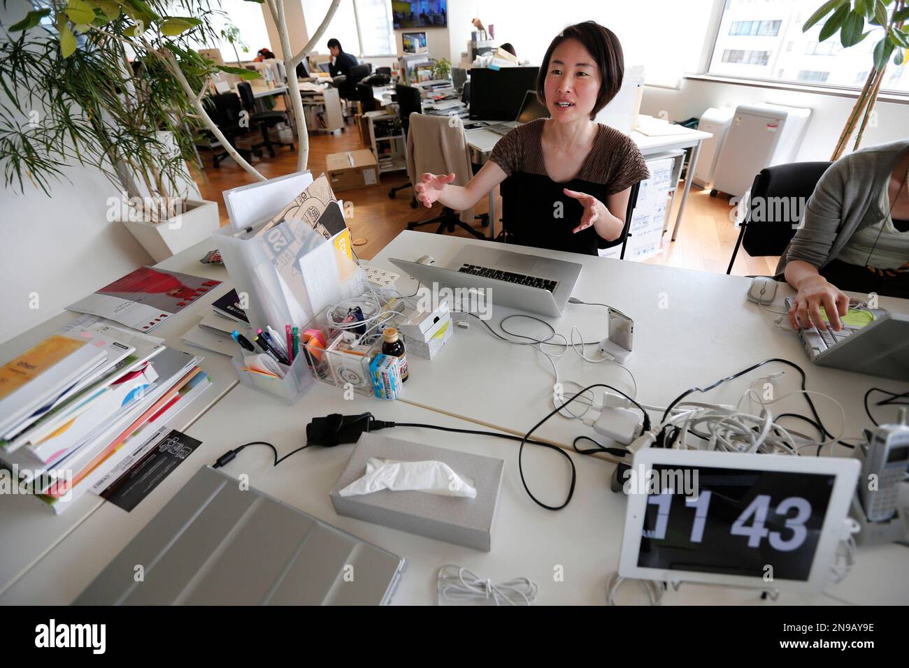 In this photo taken Wednesday, July 4, 2012, Chiaki Hayashi, co-founder of the Loftwork Inc ...