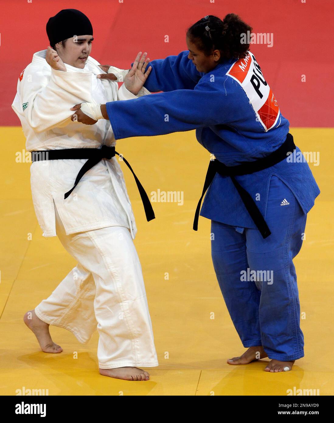 Saudi Arabia's Wojdan Shaherkani and Puerto Rico's Melissa Mojica ...