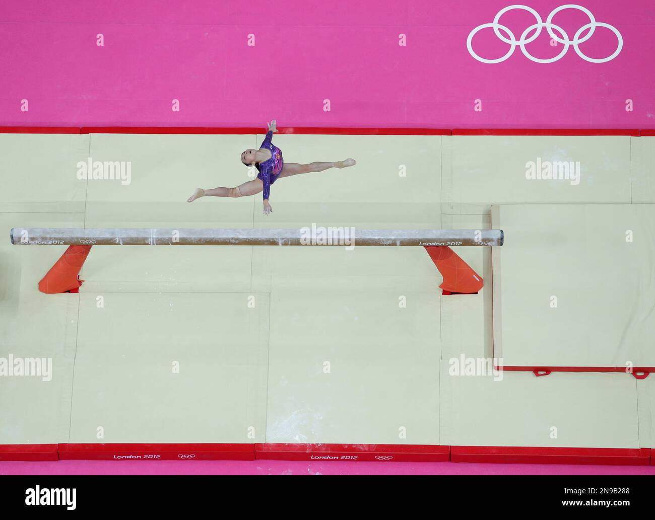 Chinese gymnast Deng Linlin performs on the balance beam during the ...