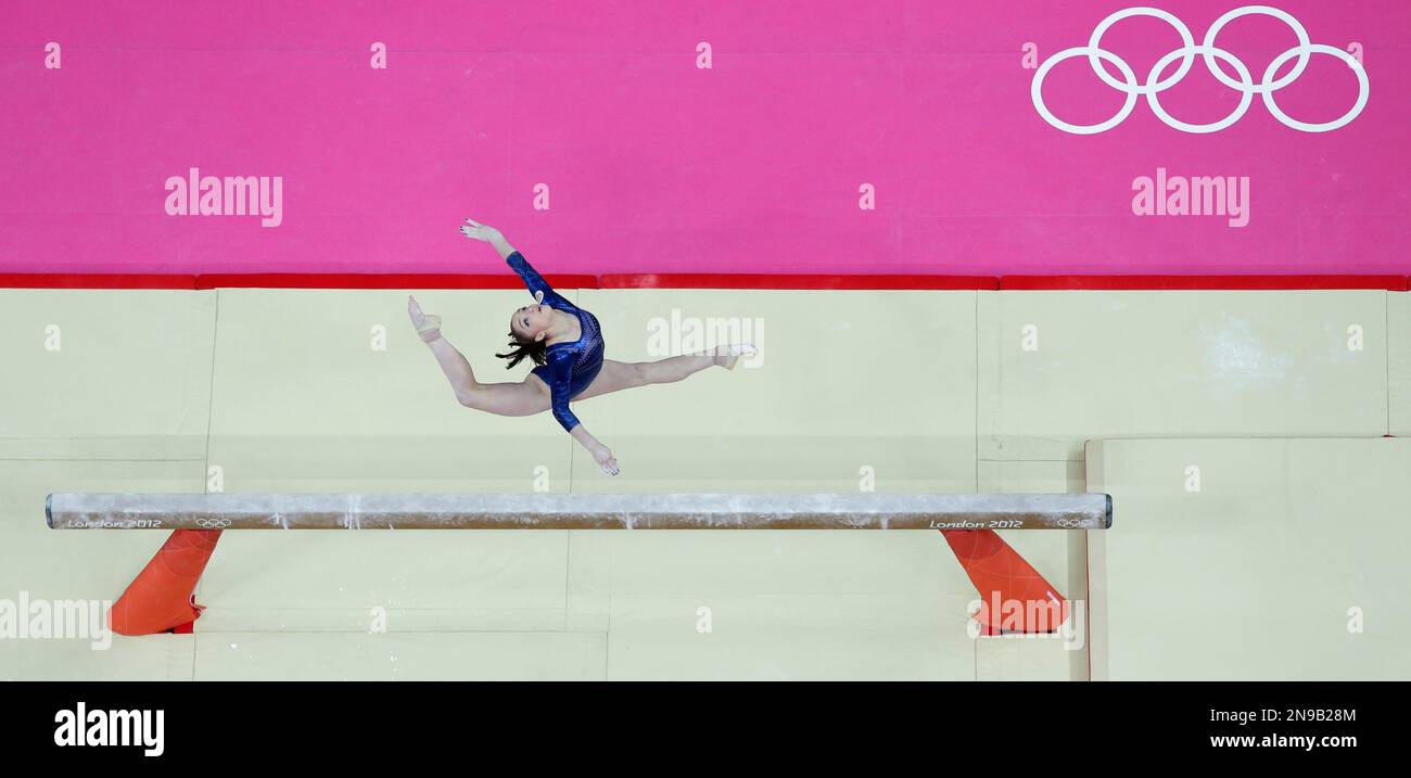 Bronze medallist Russian gymnast Aliya Mustafina performs on the ...