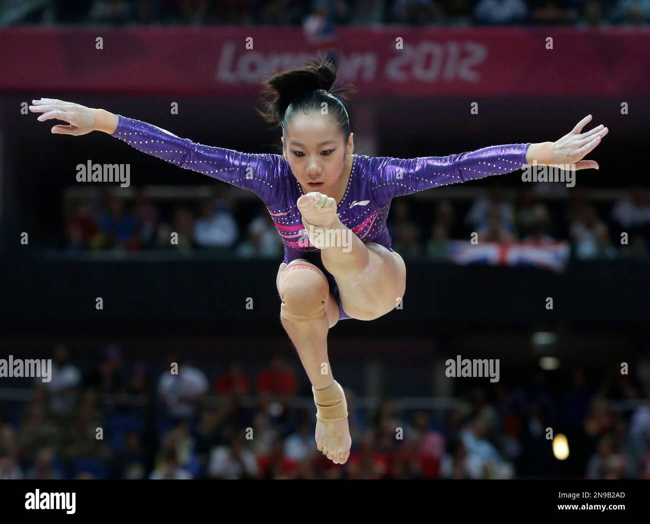 Chinese gymnast Deng Linlin performs on the balance beam during the ...