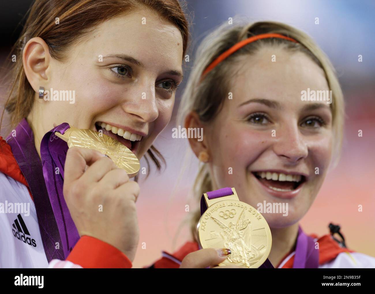 Germany's Kristina Vogel, right and teammate Miriam Welte, show their ...