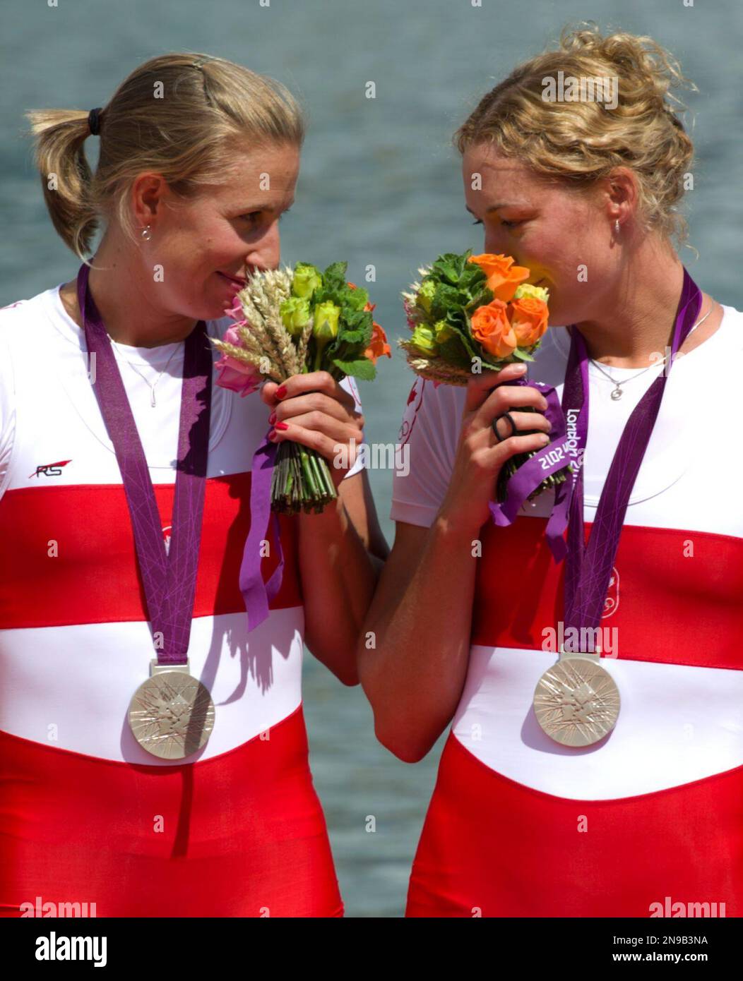 Canada's women's eight rowing team members Janine Hanson, left, and ...