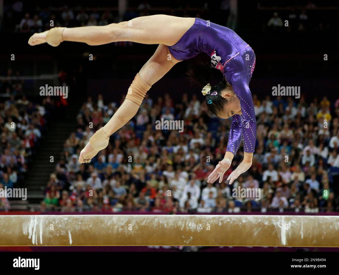 Chinese gymnast Deng Linlin performs on the balance beam during the ...