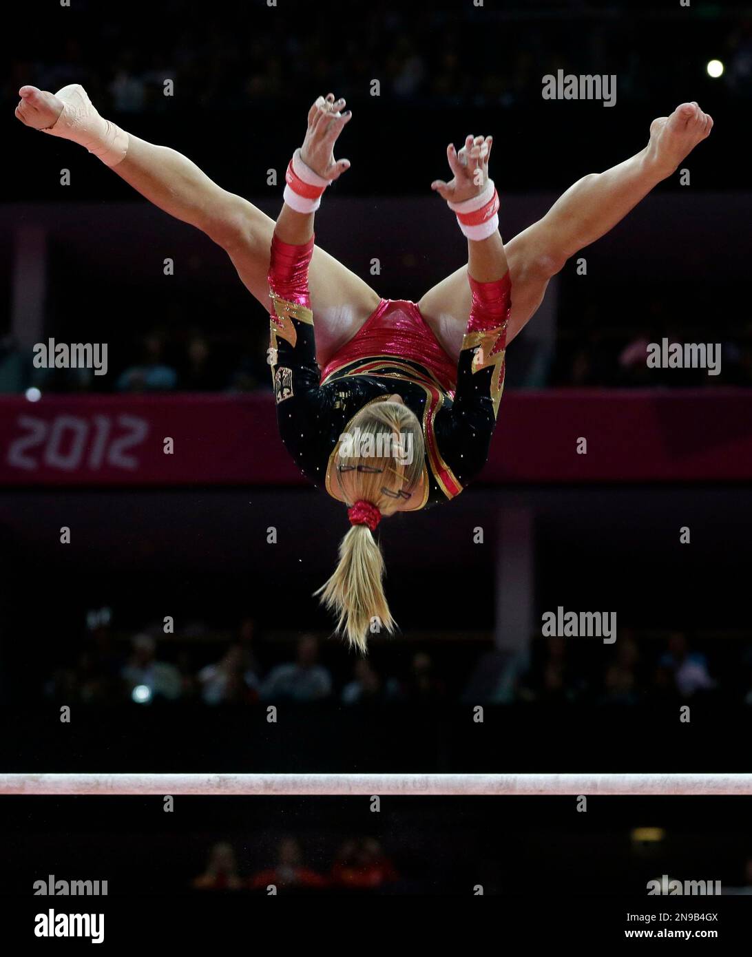 German gymnast Elisabeth Seitz performs on the uneven bars during the ...