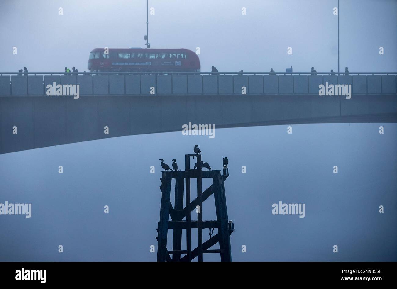 London bridge & the Shard in the mist in central London as a cold ...