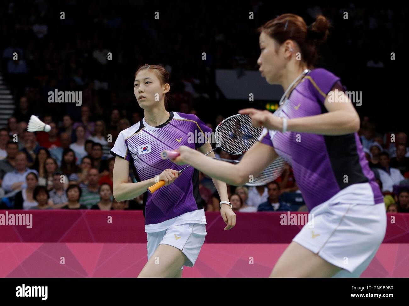 South Korea's Kim Ha-na, left, and Jung Kyung-eun play against Wang ...